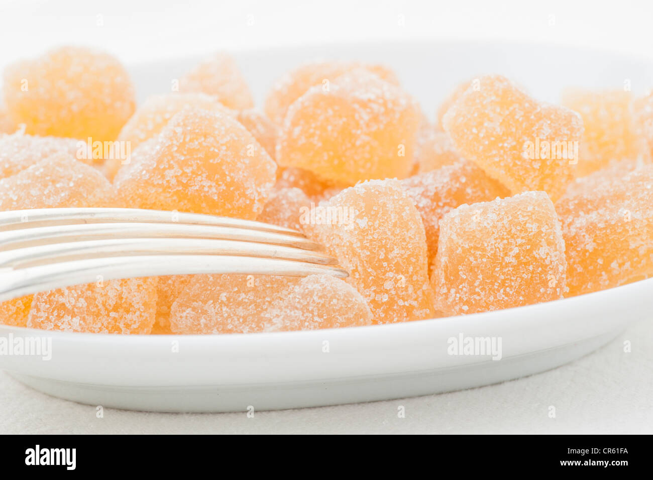 Dried ginger coated with sugar Stock Photo - Alamy