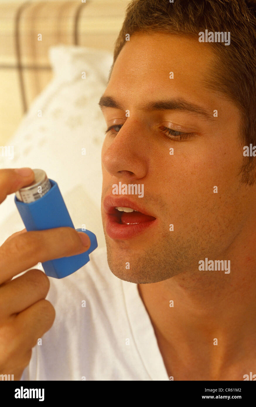 Close-up shot man male using inhaler Stock Photo - Alamy