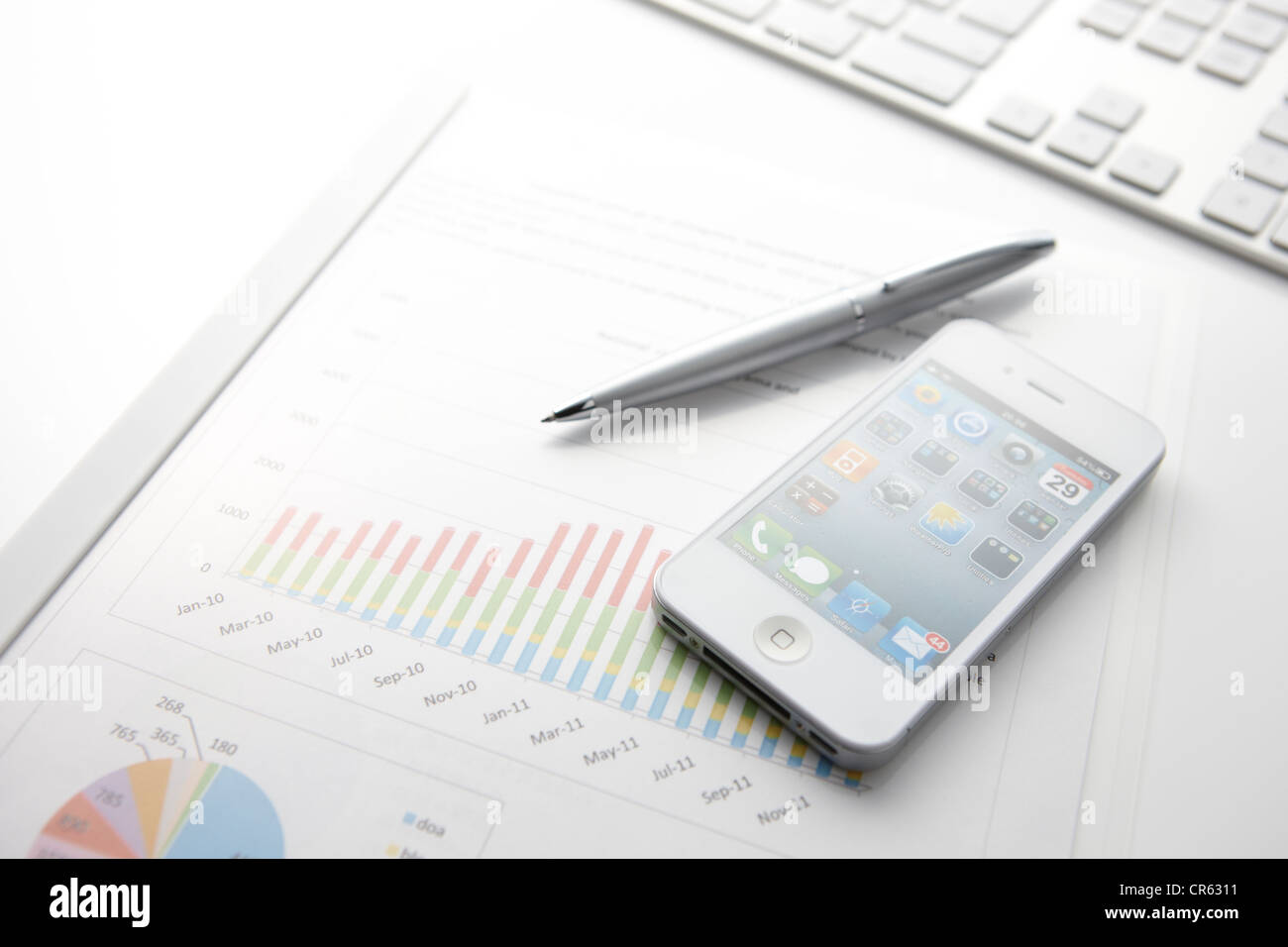 Smart Phone on Graph Stock Photo - Alamy