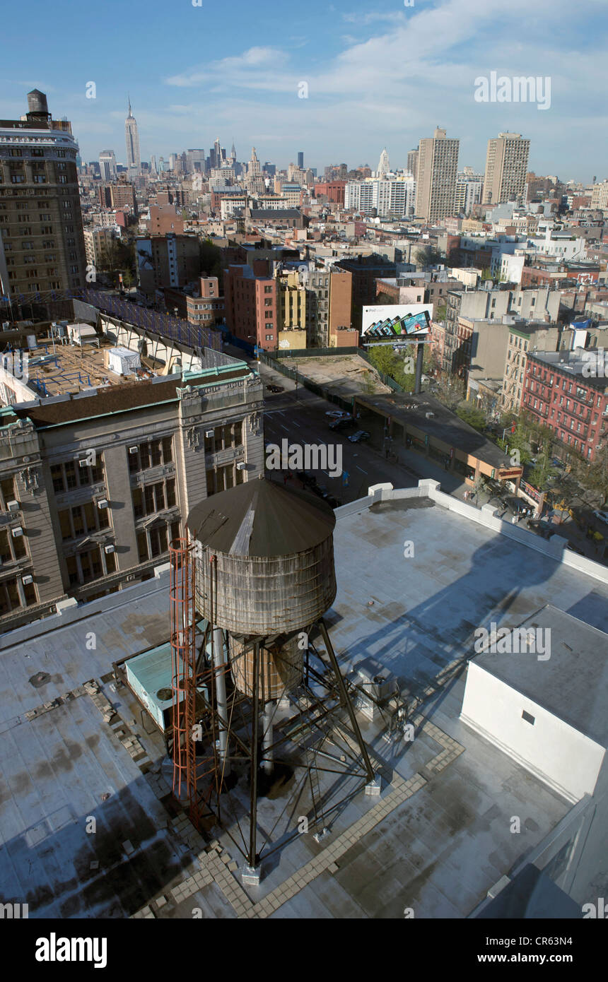 United States, New York City, Manhattan, Soho, building with water tank ...
