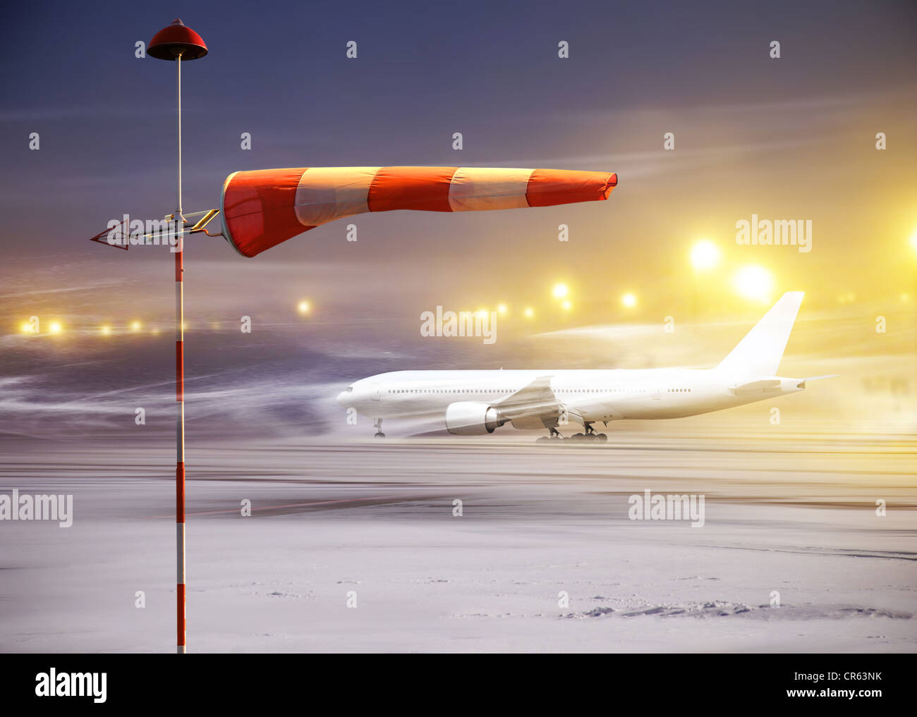 Meteorology windsock inflated by wind in airport at non-flying night ...