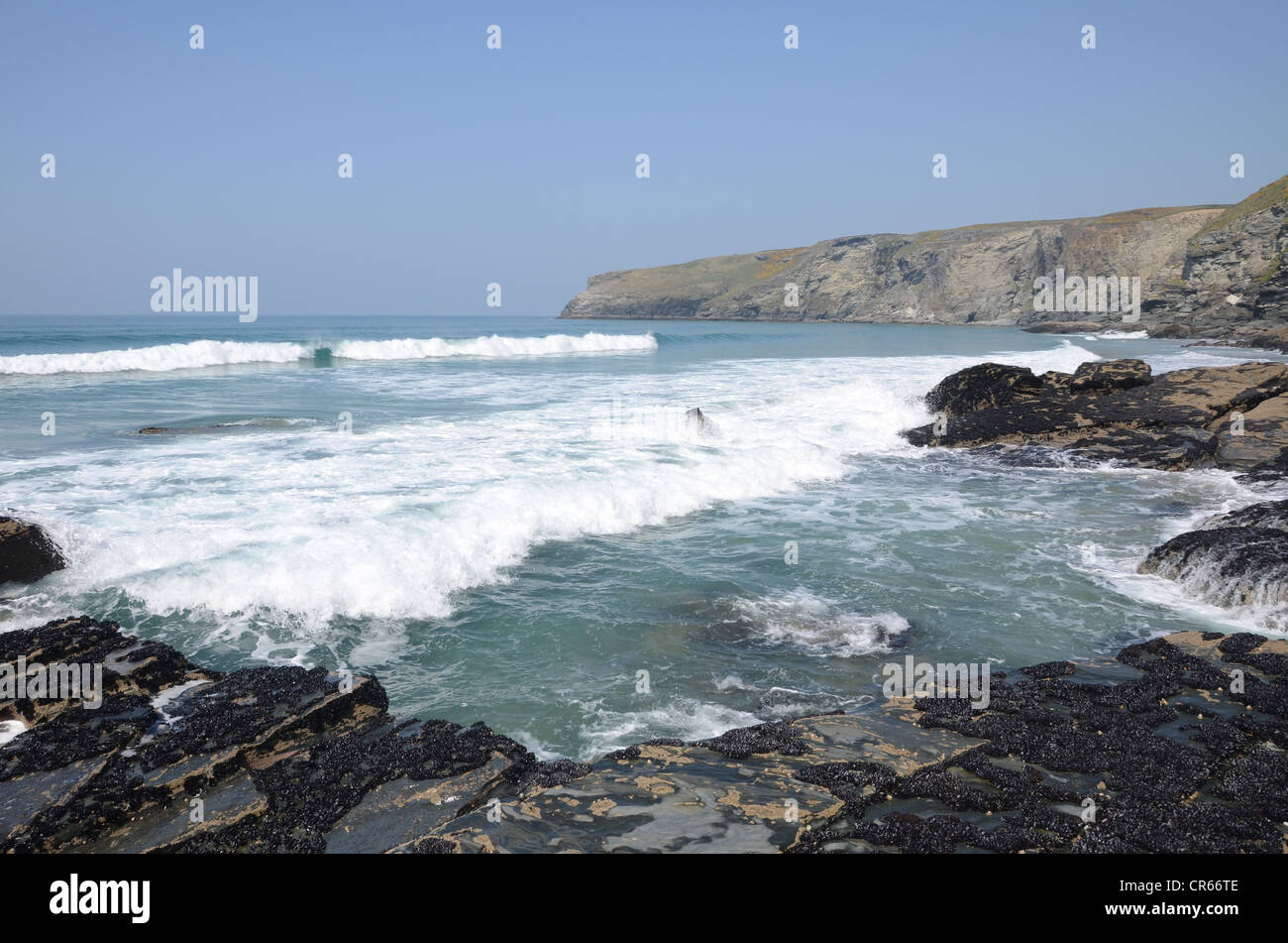 Cliffs and surf Stock Photo - Alamy
