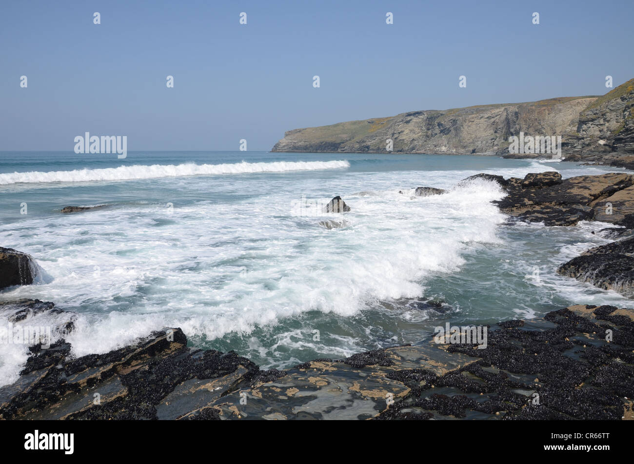 Cliffs and surf Stock Photo - Alamy