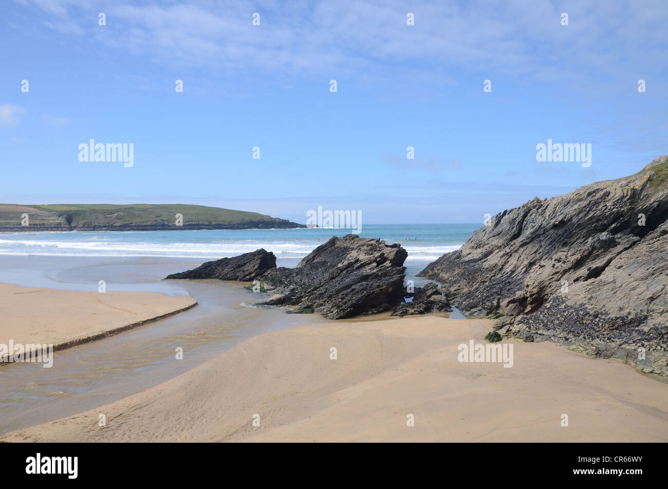 Beach with rocks and cliff Stock Photo - Alamy