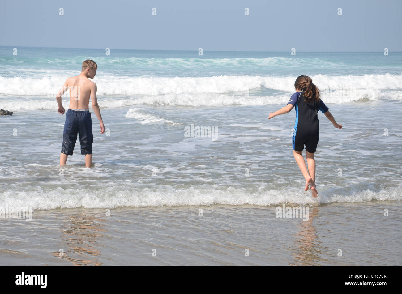 Children paddle in sea fun hi-res stock photography and images - Alamy