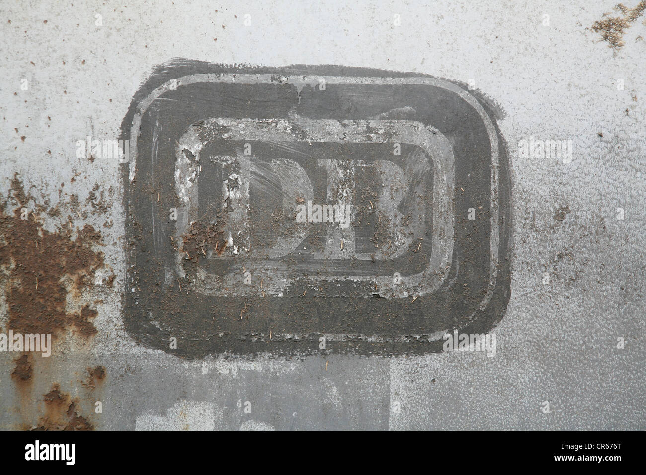 Weathered logo of Deutsche Bahn, German railways company, on a waggon ...