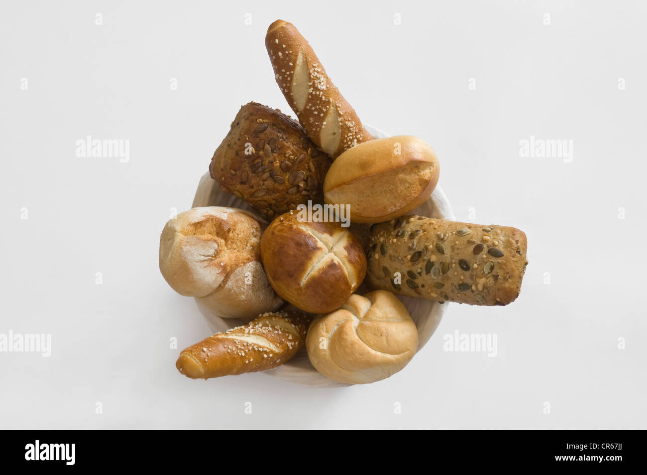 Basket with different kinds of rolls and pretzel varieties, breakfast ...