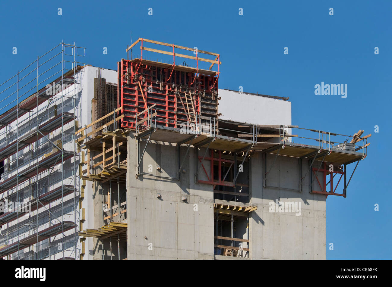 Construction of a building, cladding of the new components with ...