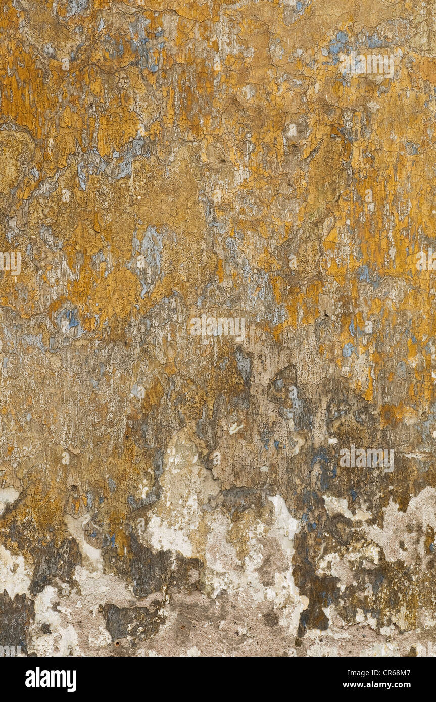 Wall with layers of old paint and plaster, background Stock Photo - Alamy