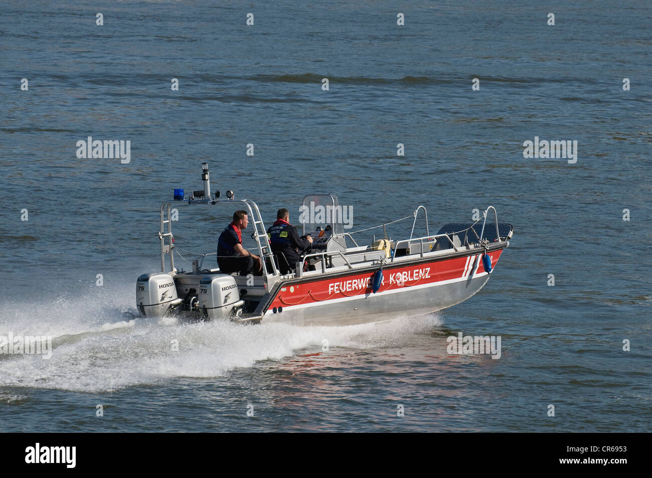 Manned boat of the Koblenz fire department at full speed, Rhineland ...