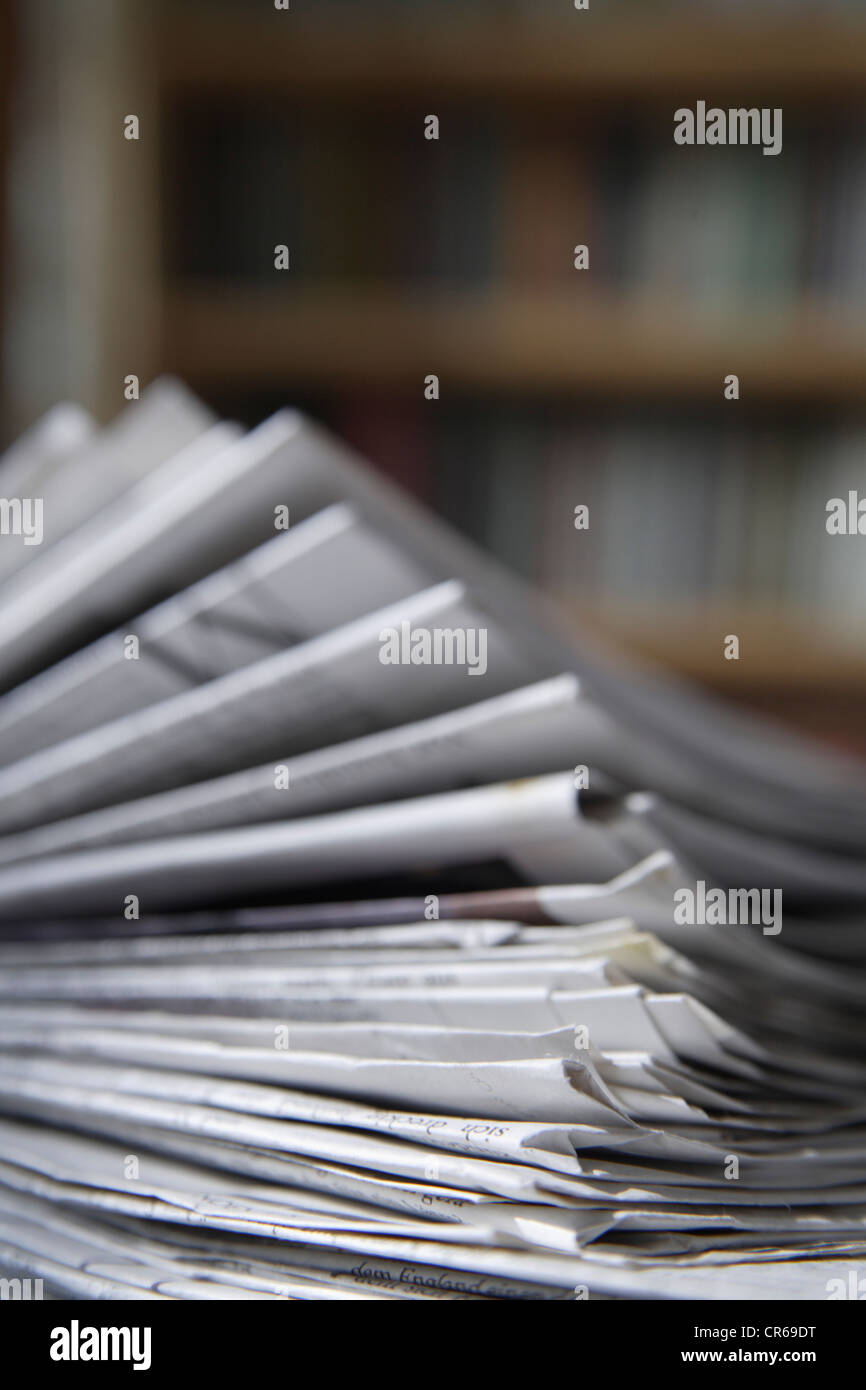 Germany, Stack of newspapers, close up Stock Photo - Alamy