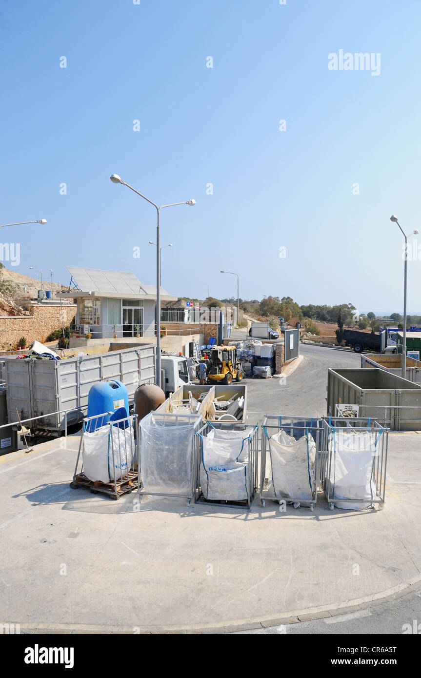 A civic amenity site where different recyclable materials are separated ...