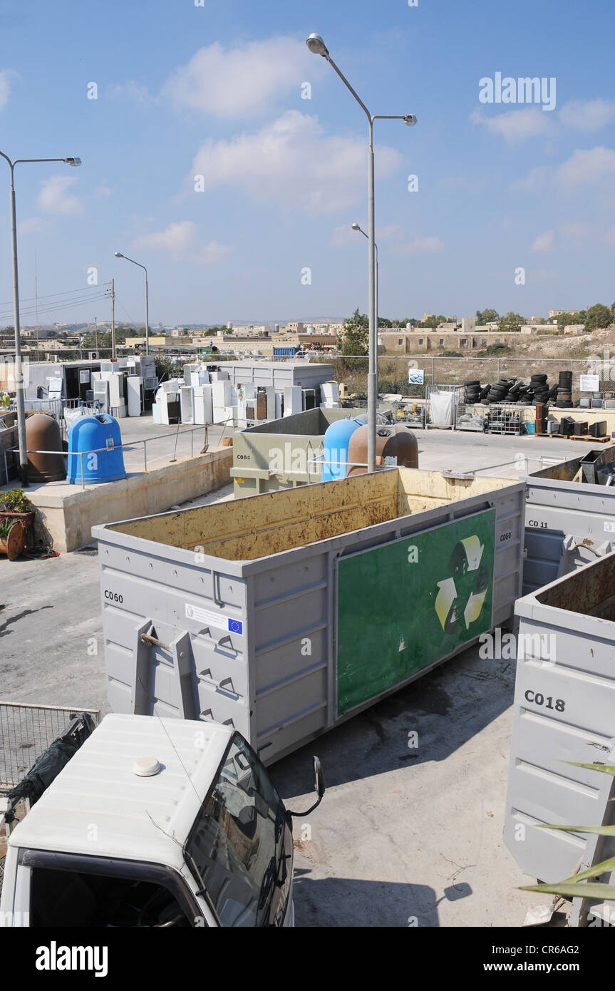 A civic amenity site where different recyclable materials are separated ...