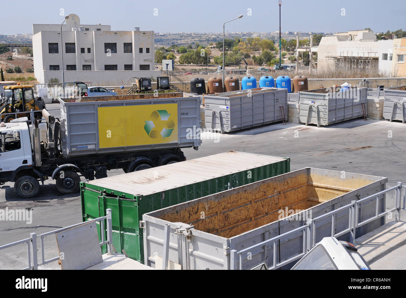 A civic amenity site where different recyclable materials are separated ...