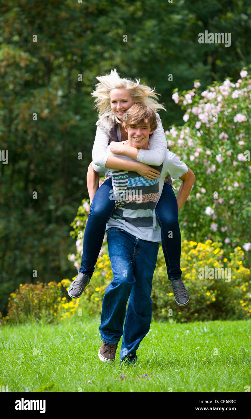 Piggy back ride adults hi-res stock photography and images - Alamy