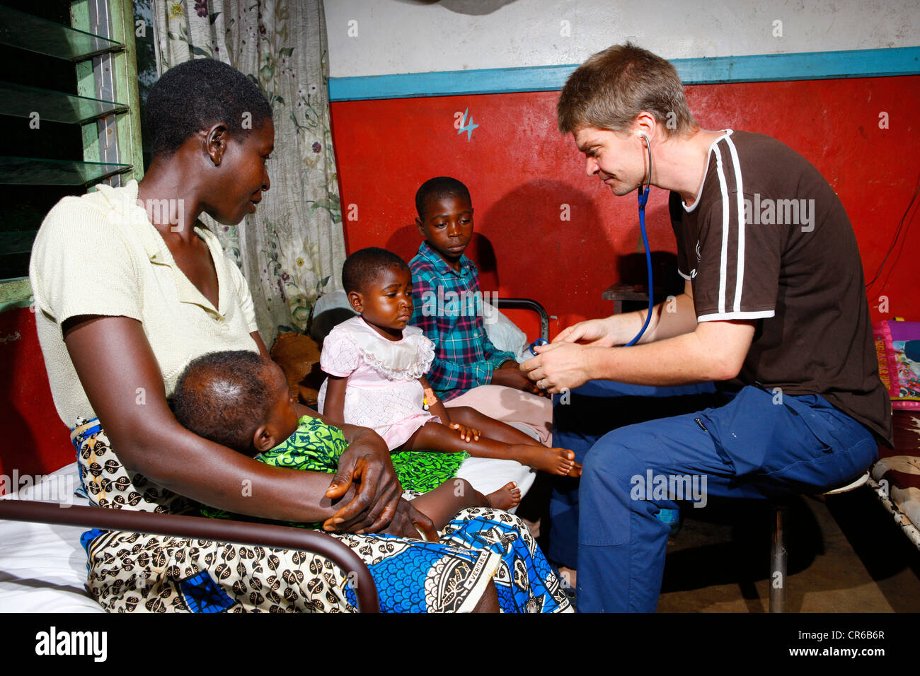 Doctors examining children, ward round in the children's ward, hospital ...