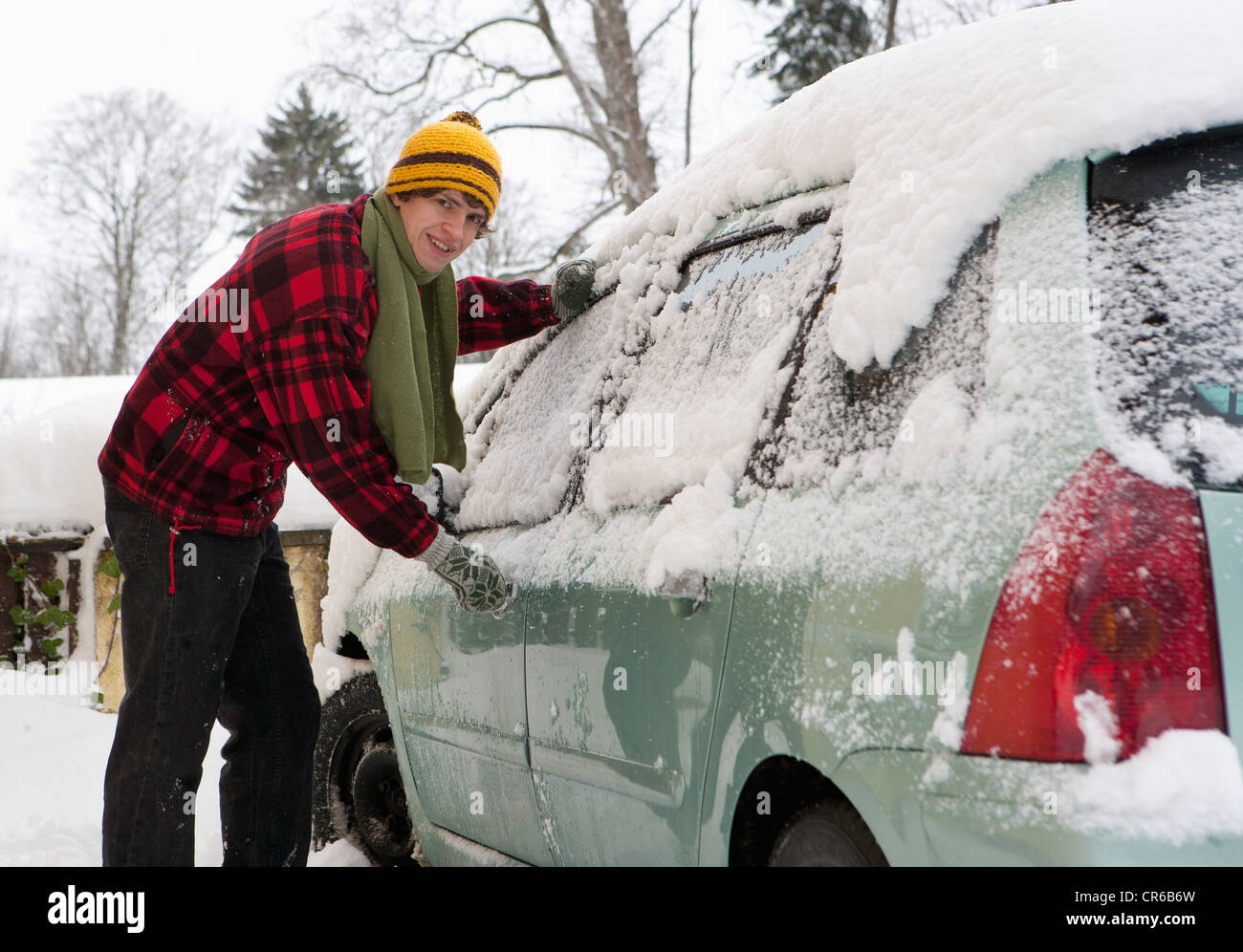 Young man opening car lock hi-res stock photography and images - Alamy