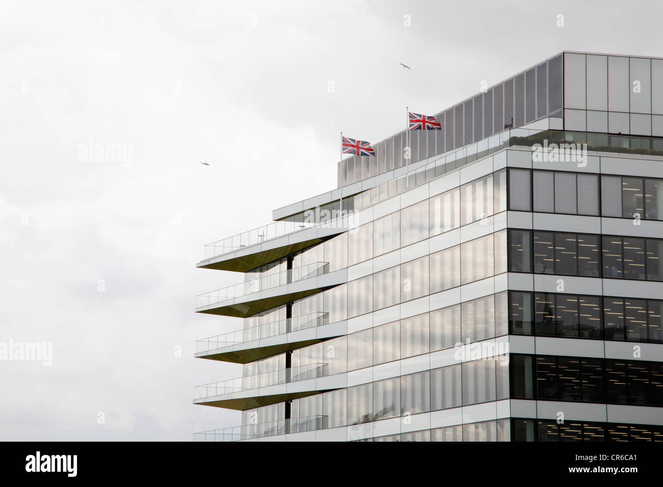 England, London, Modern architecture with british flags Stock Photo - Alamy