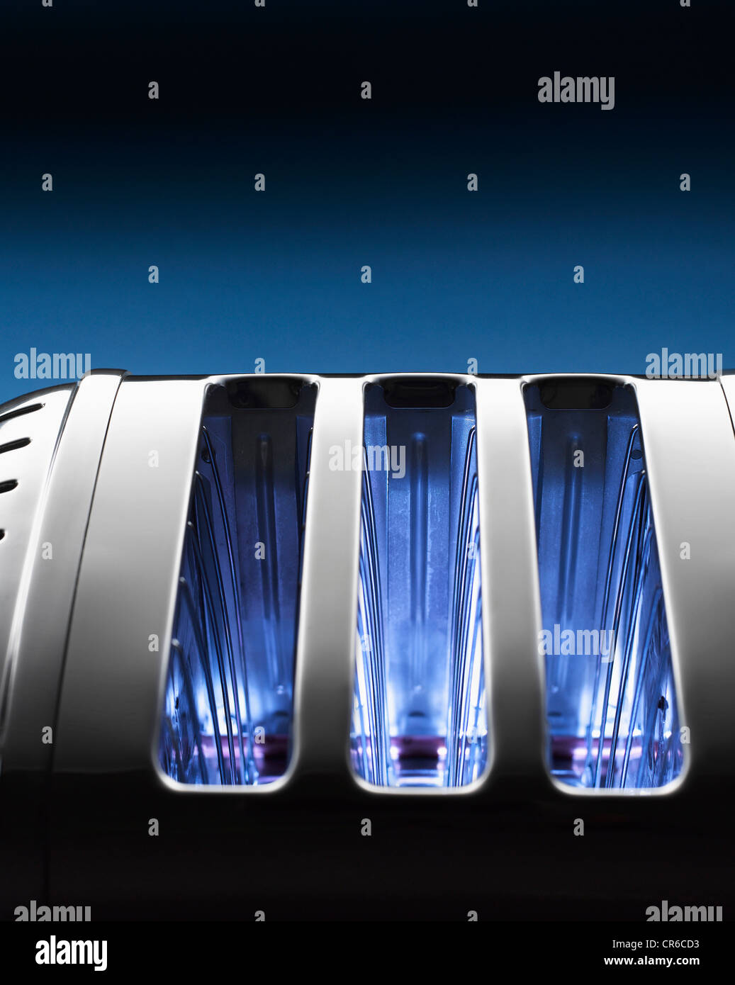 Cool toaster against blue background Stock Photo - Alamy