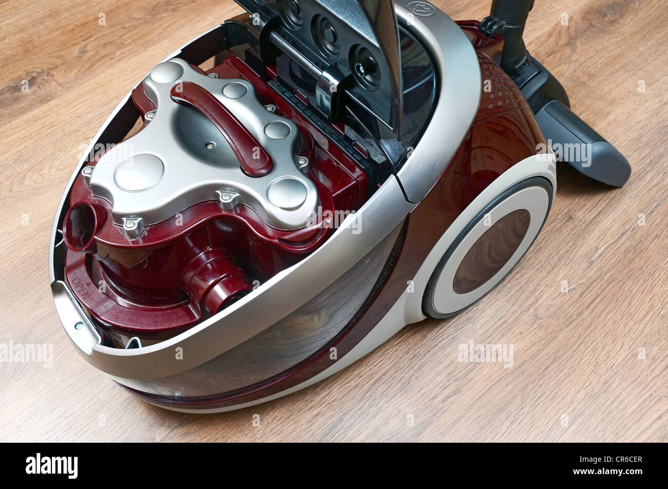 red vacuum cleaner with water filter Stock Photo - Alamy