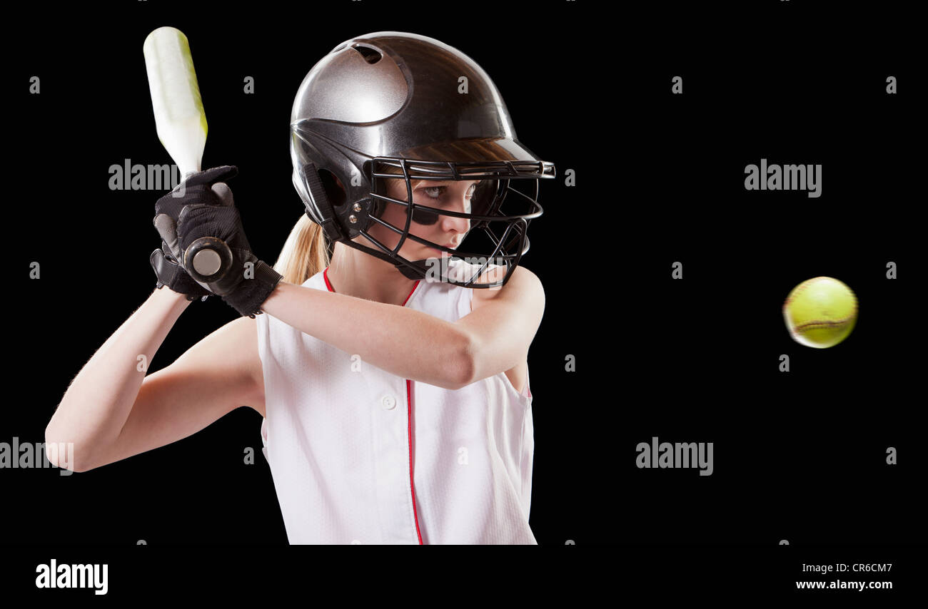 Girl hitting softball hi-res stock photography and images - Alamy