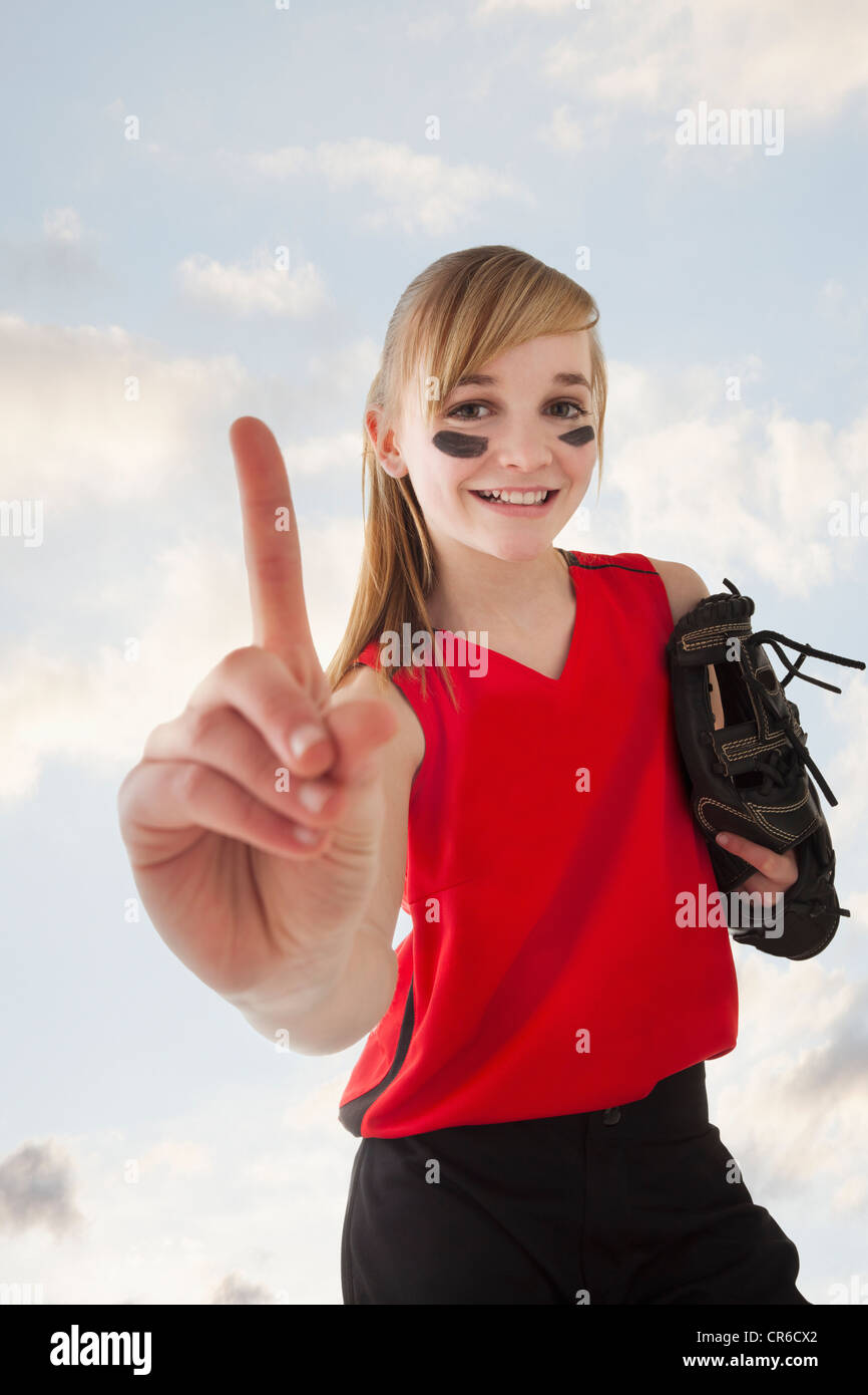 Portrait of girl (12-13) plying softball Stock Photo - Alamy