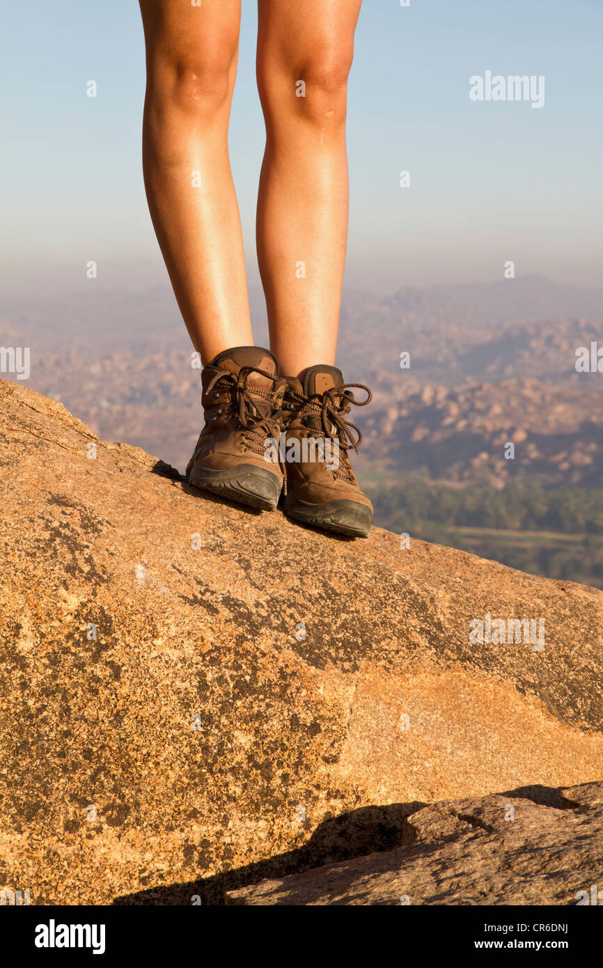 India, Karnataka, Hampi, Young woman walking on rock Stock Photo - Alamy