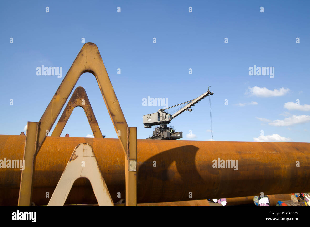 Crane lifting pipe at steel mill hi-res stock photography and images ...