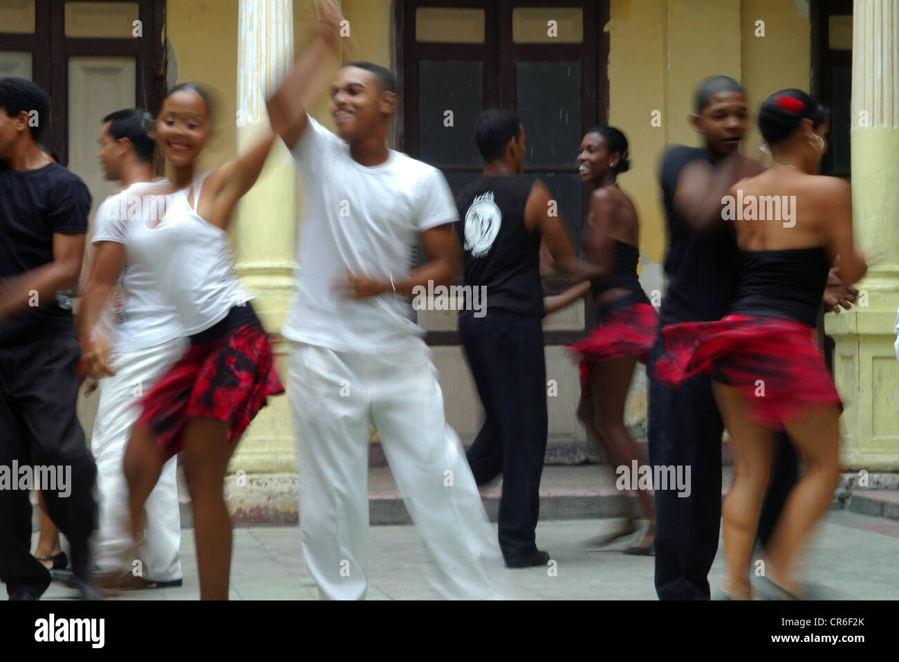 Cuban salsa dancers traditional colonial building dancing, Santiago de ...