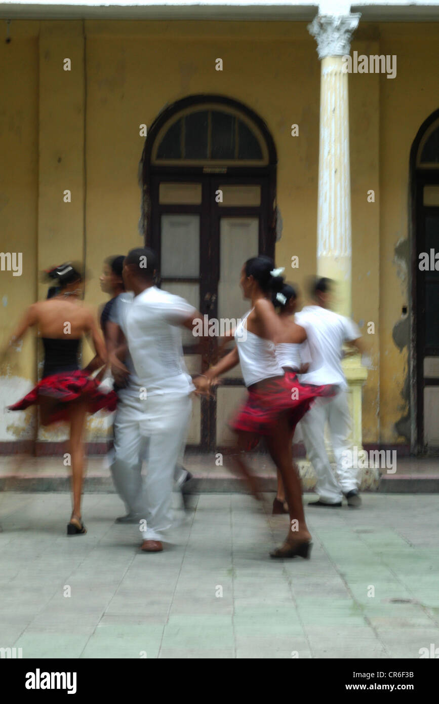 Cuban salsa dancers traditional colonial building dancing, Santiago de ...