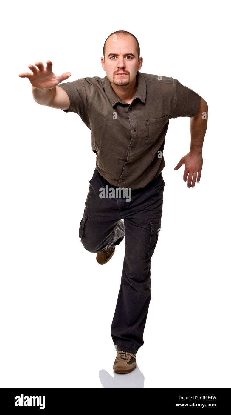 caucasian man in run pose isolated on white background Stock Photo - Alamy
