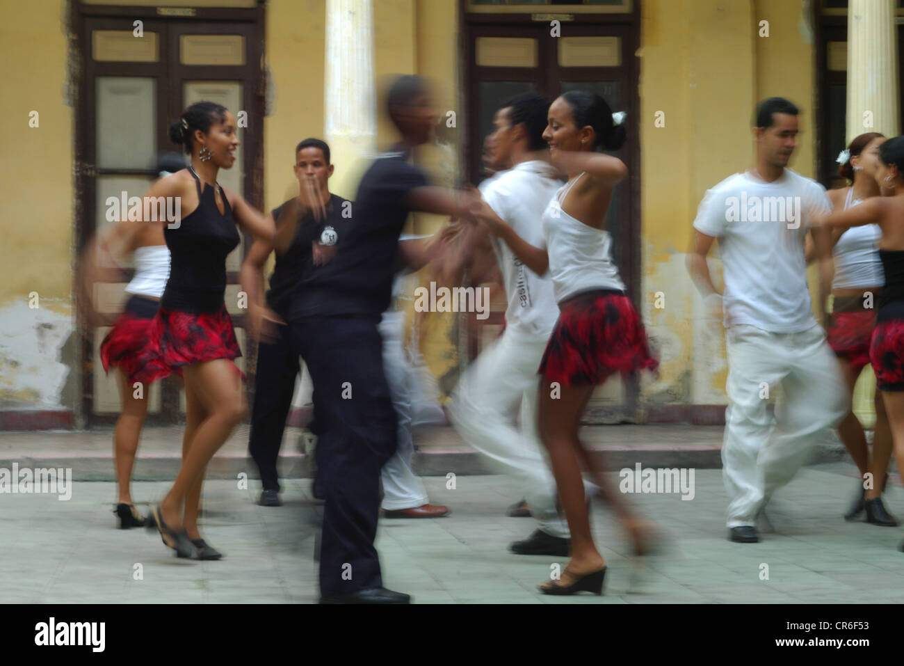 Cuban salsa dancers traditional colonial building dancing, Santiago de ...