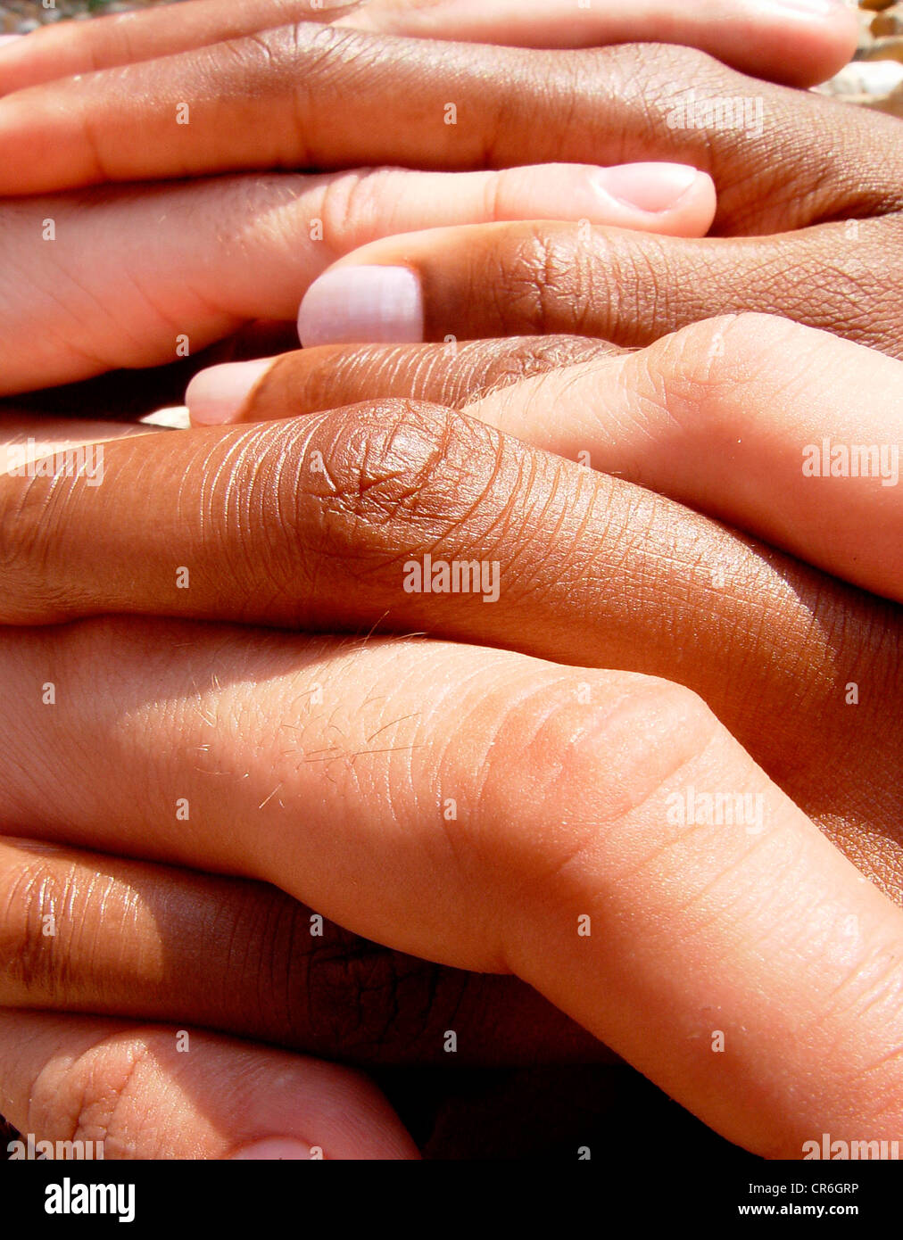 hands held together in a friendship and love manner Stock Photo - Alamy