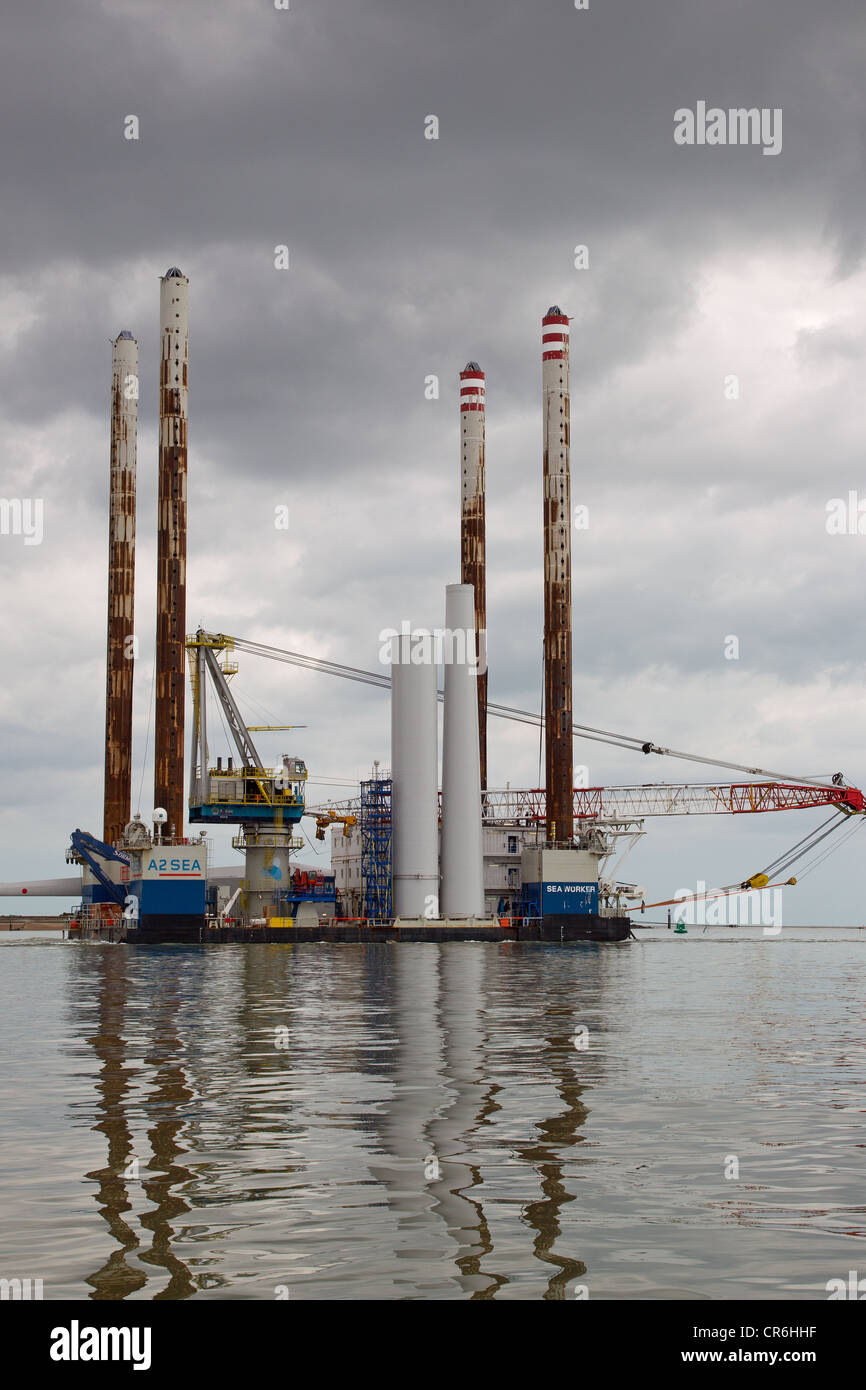 A wind farm construction barge en route to a construction site in the ...