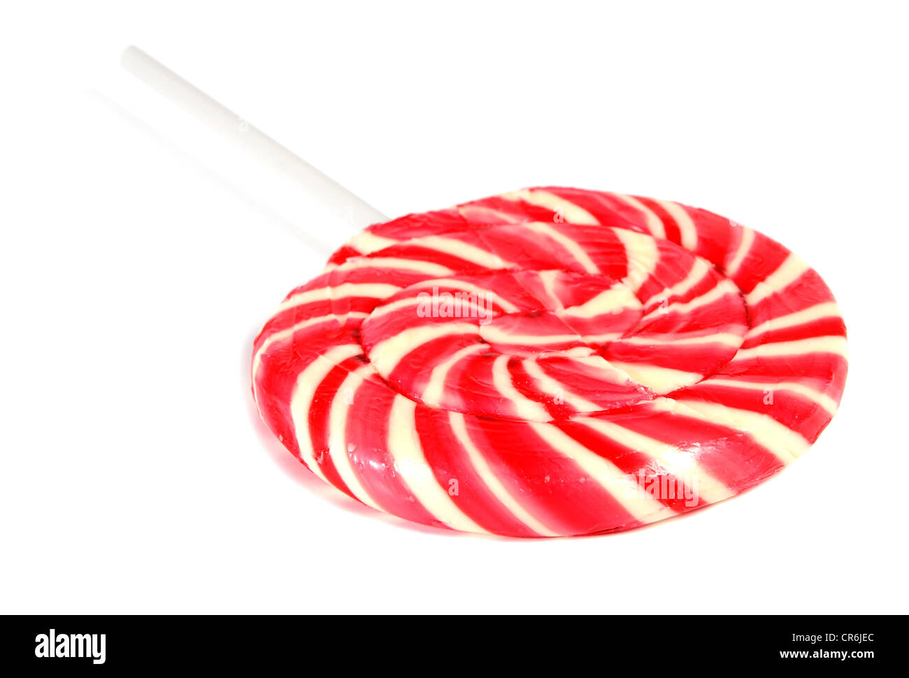 candy pink spiral lollipop isolated on white background Stock Photo - Alamy