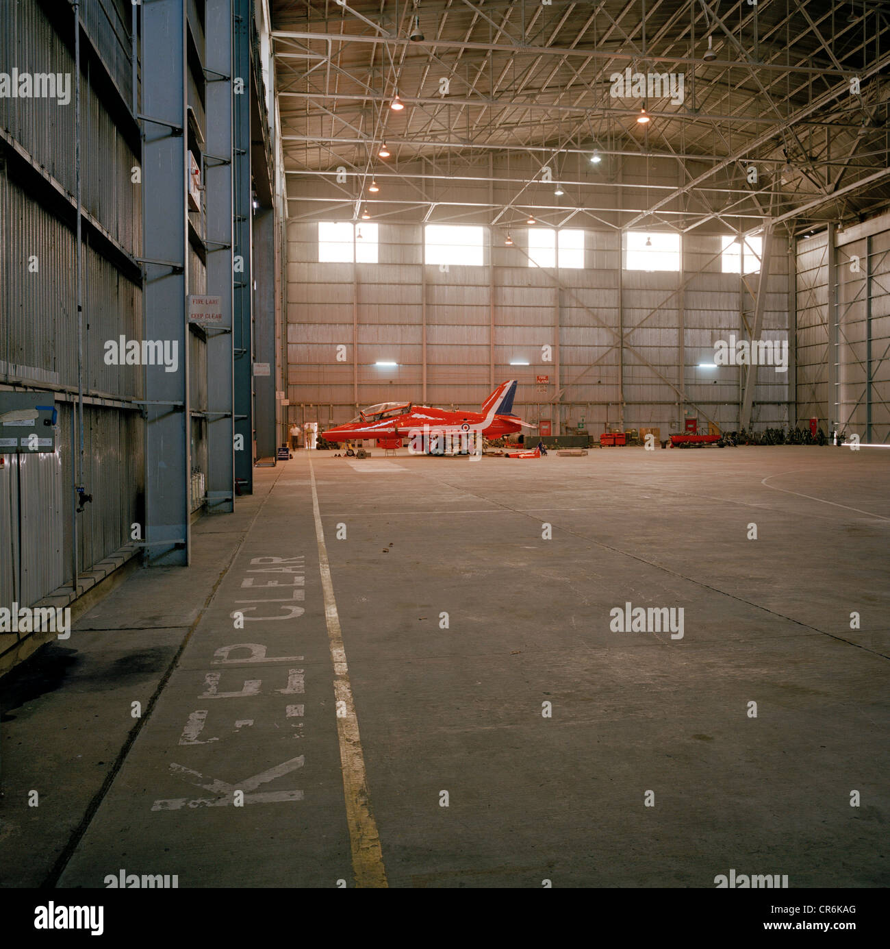 A grounded Hawk jet in a hangar used by the Red Arrows, Britain's RAF ...