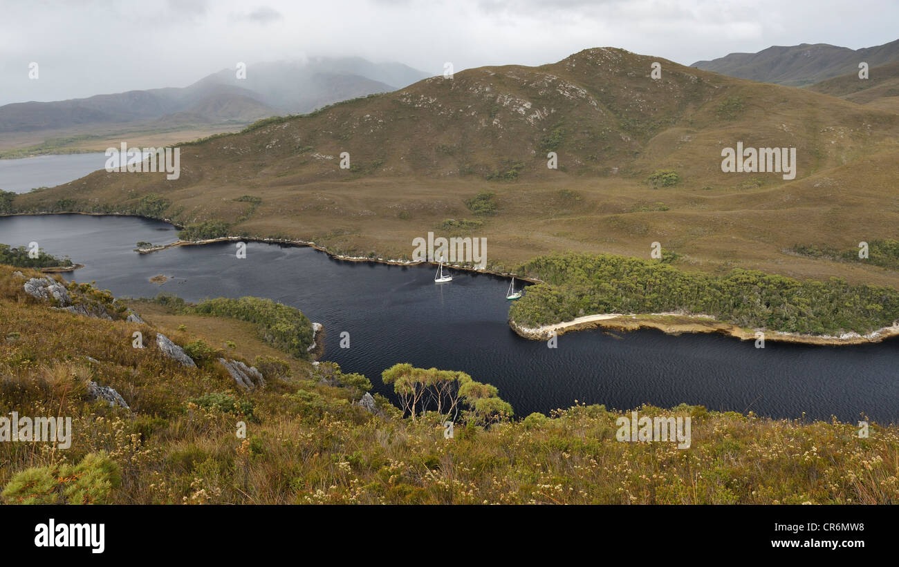 Topshot of Casilda Cove with two cruising yachts at anchor. Port Davey ...