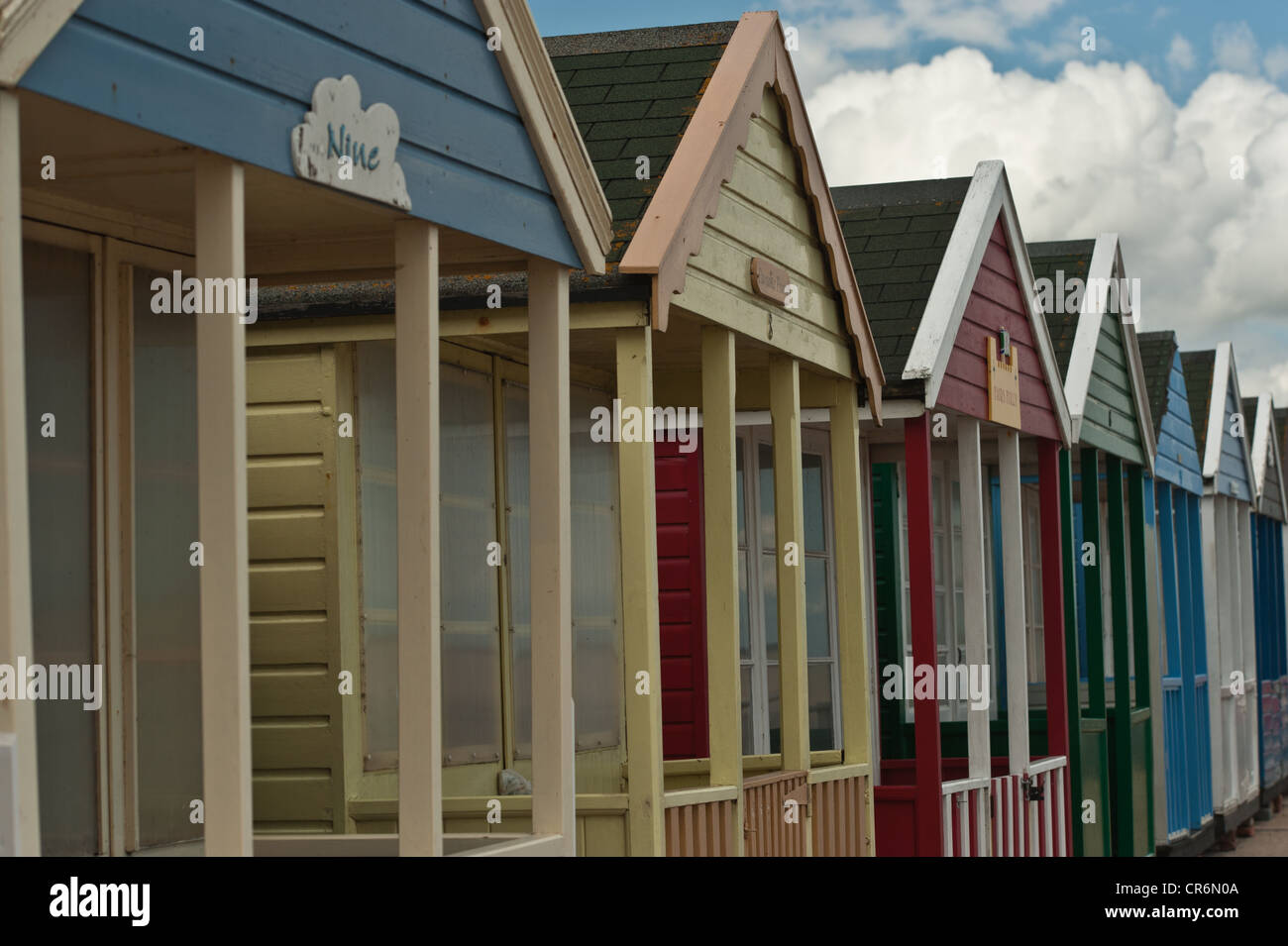 Row of colourful Beach Huts, chalets Stock Photo - Alamy