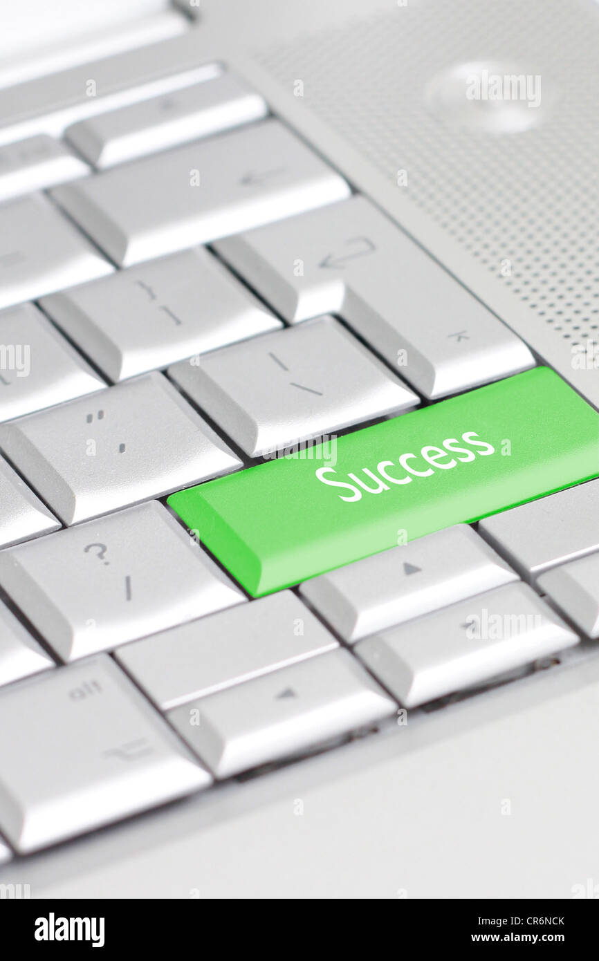 A keyboard with a success option Stock Photo - Alamy