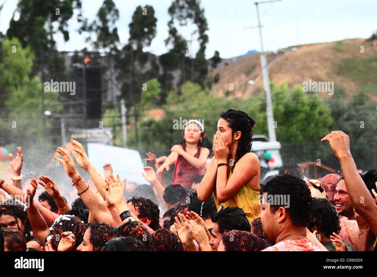 People washing up after the battle of tomatoes during the festival of ...