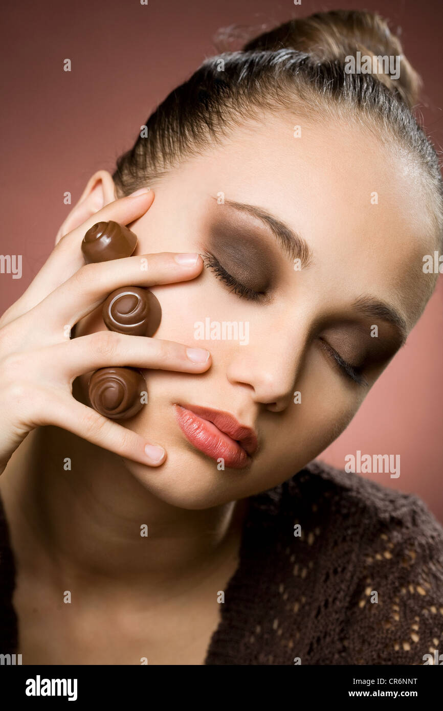 Never enough chocolate, striking young brunette with dessert overload ...