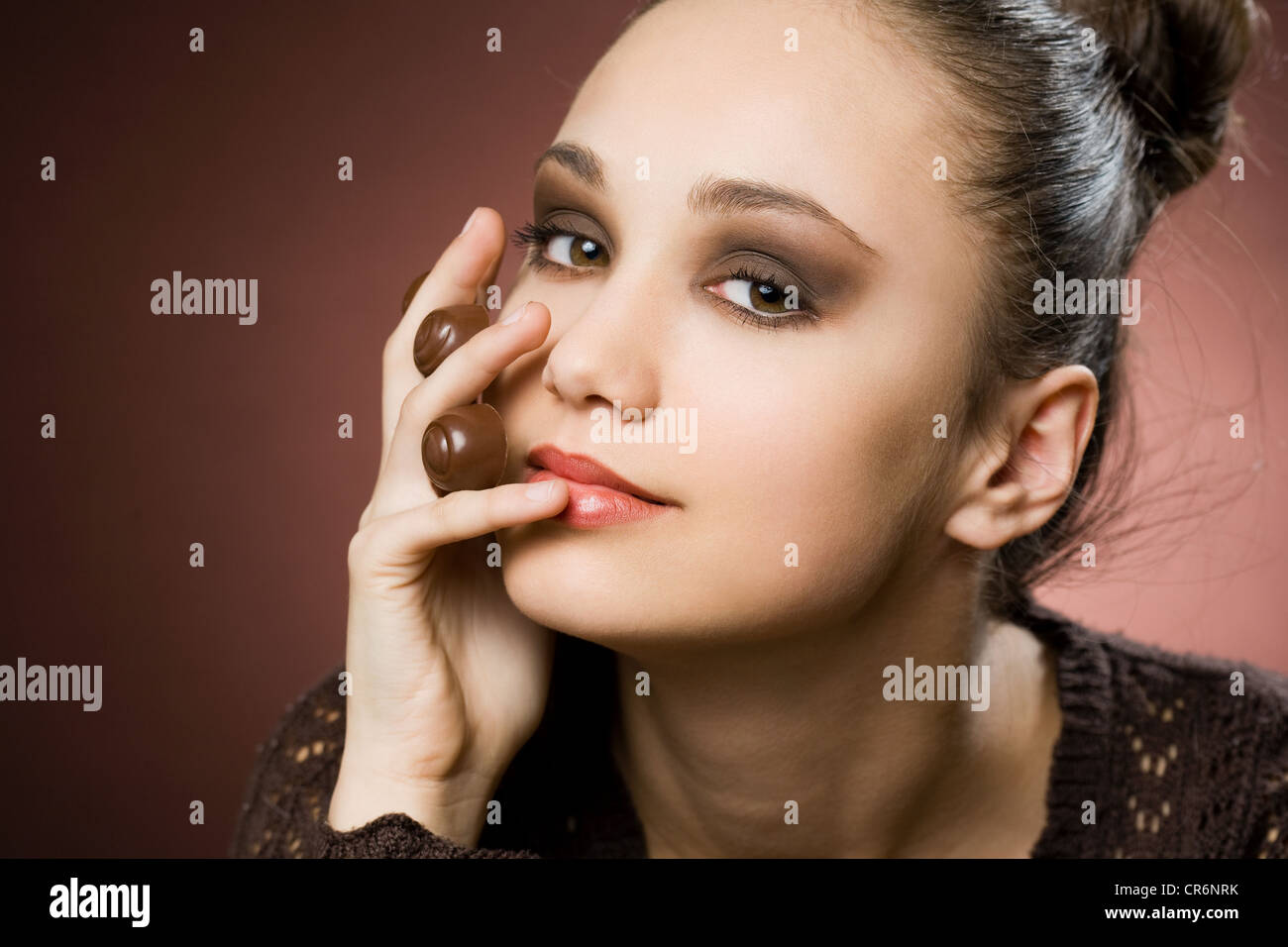 Never enough chocolate, striking young brunette with dessert overload ...