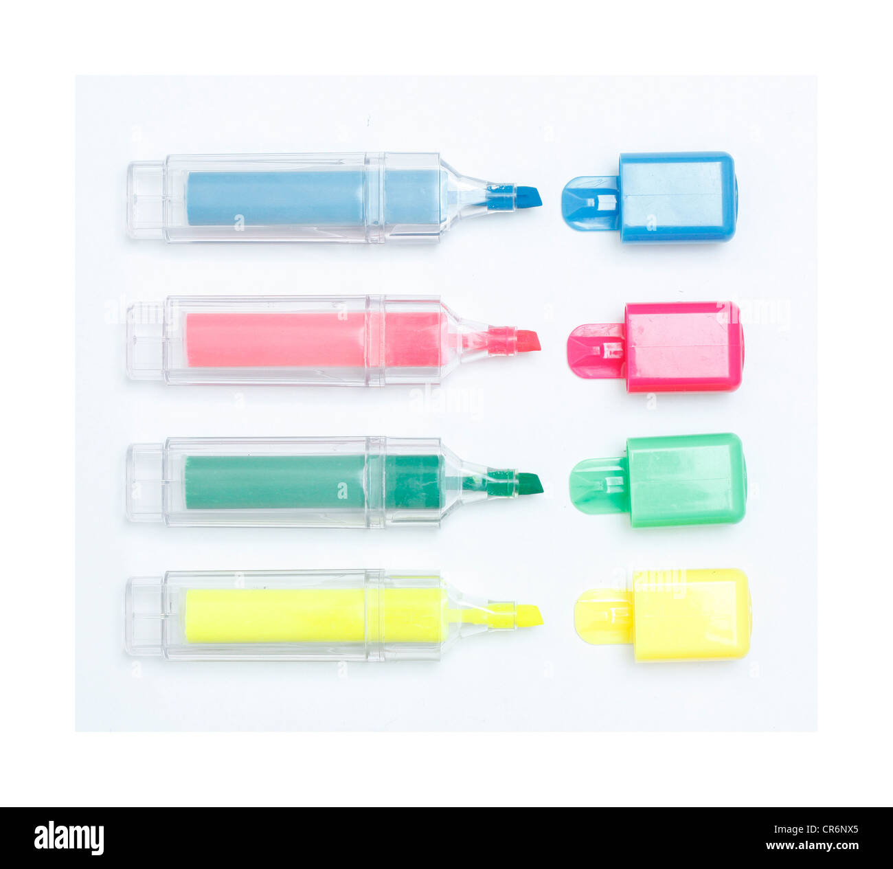 Four markers on a white background Stock Photo - Alamy