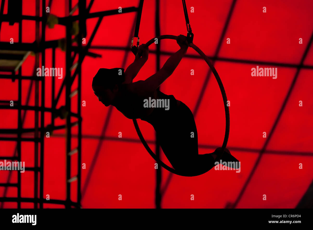 A student performs acrobatics on the aerial hoop during the lessons in ...