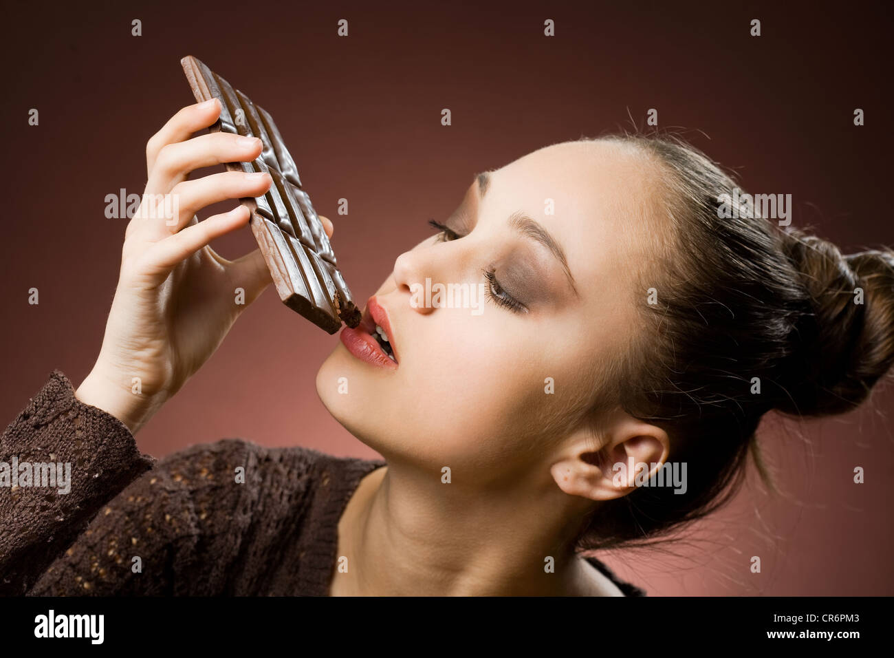 Never enough chocolate, striking young brunette with dessert overload ...