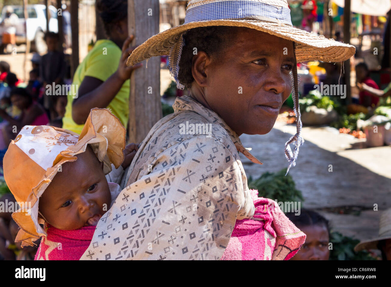 Woman carrying baby on her back hi-res stock photography and images - Alamy