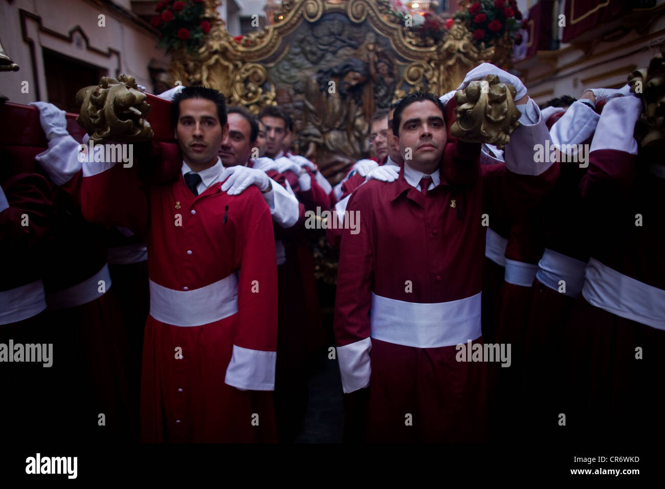 Men carry a throne on their shoulders during an Easter Holy Week ...