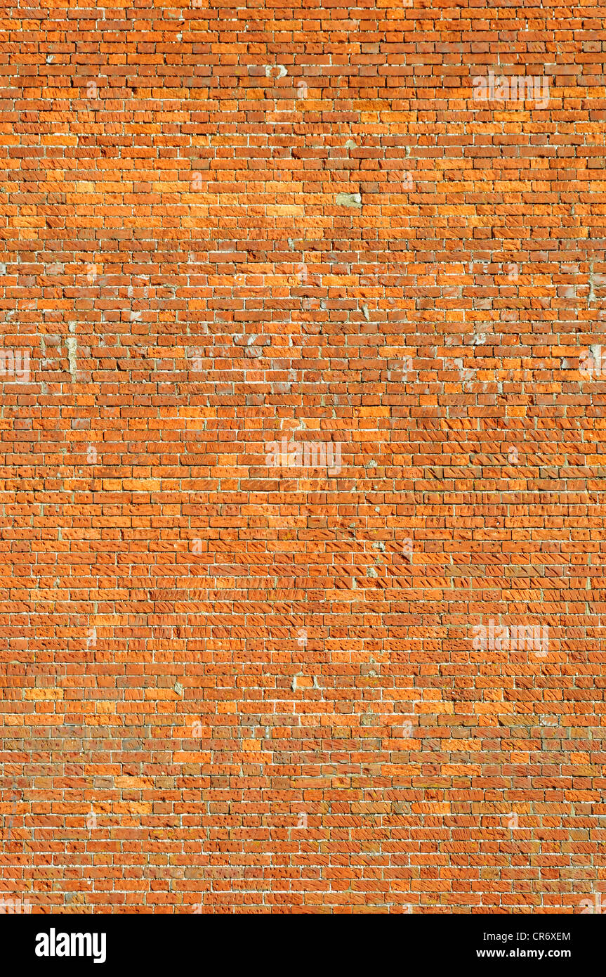 A vertical brick wall background Stock Photo - Alamy