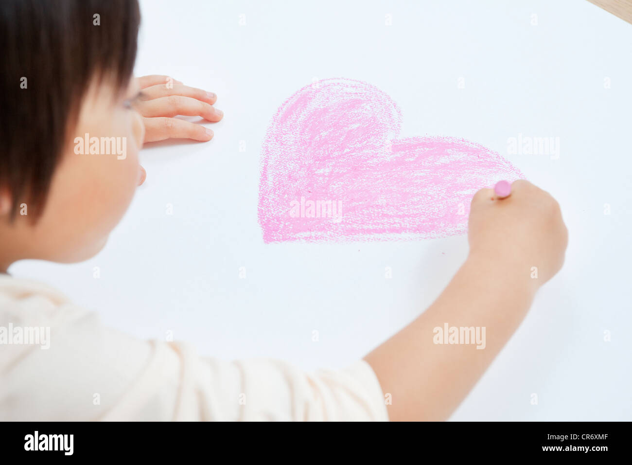 Little boy drawing a heart Stock Photo - Alamy