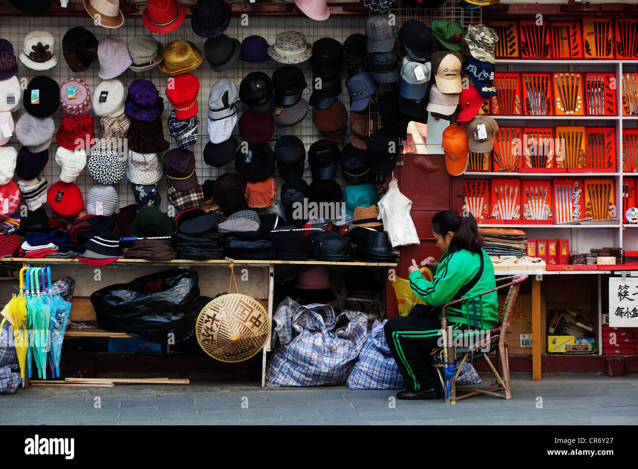 Street stall of China Shanghai selling hats and other chinese culture ...